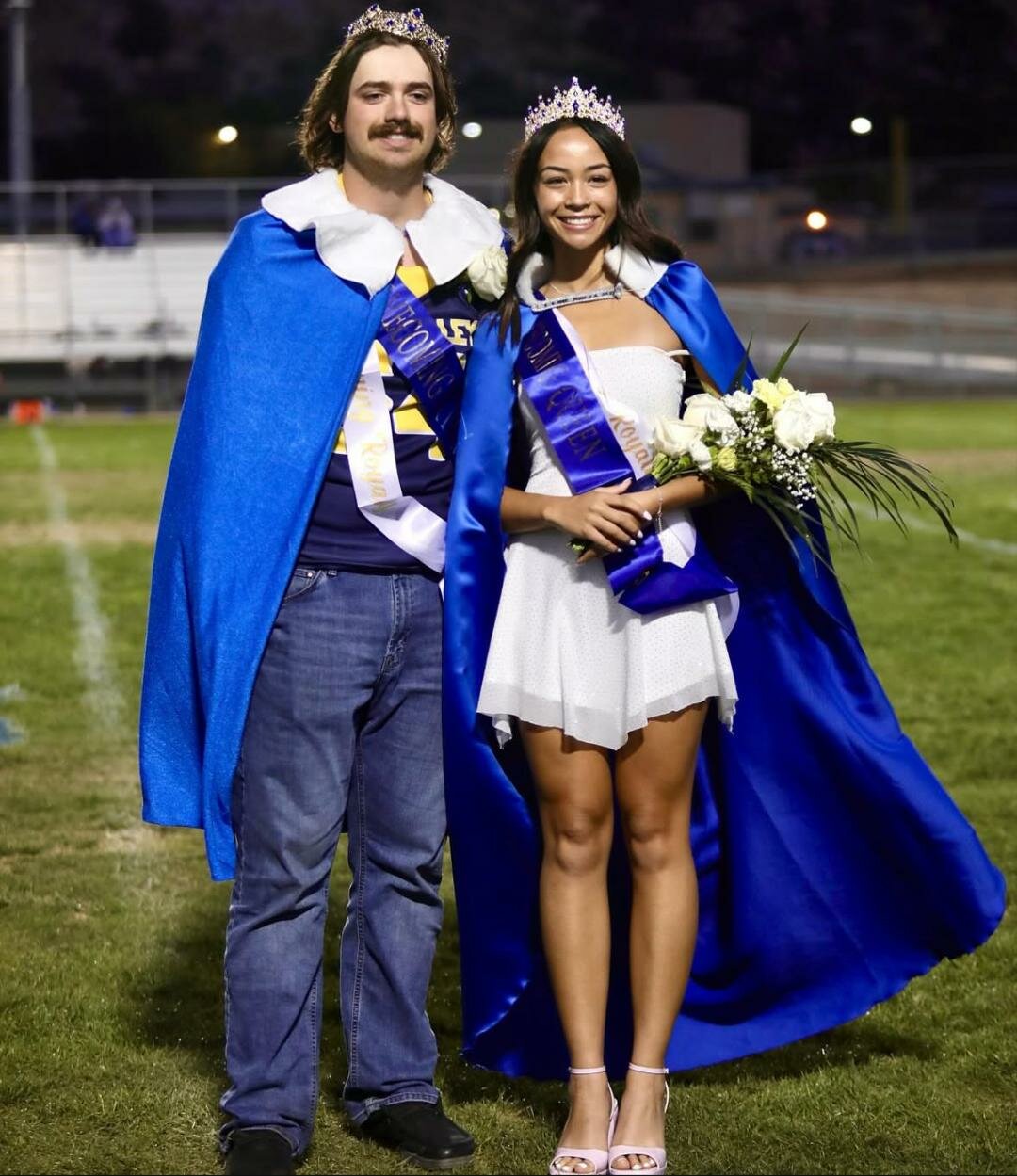 Homecoming Royal Court ushered into stadium in classical vehicles ...
