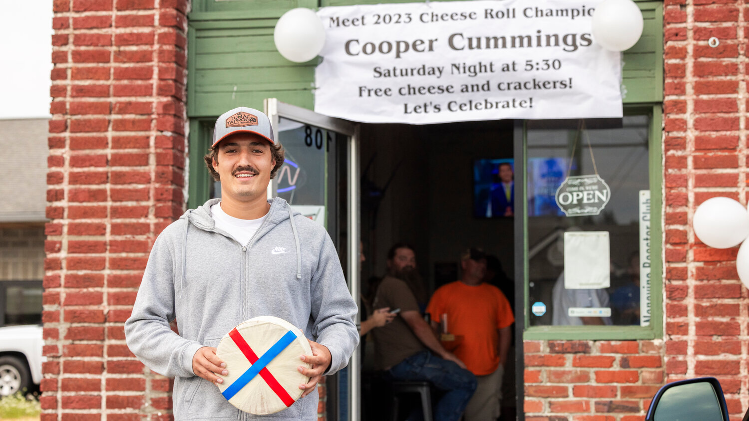 Washington man celebrates in Napavine after becoming a cheese rolling ...