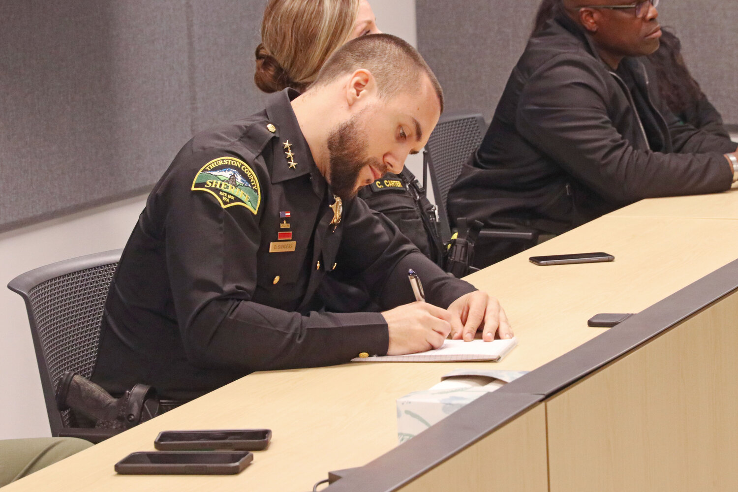 Community members bring concerns to TCSO sheriff during town hall event ...