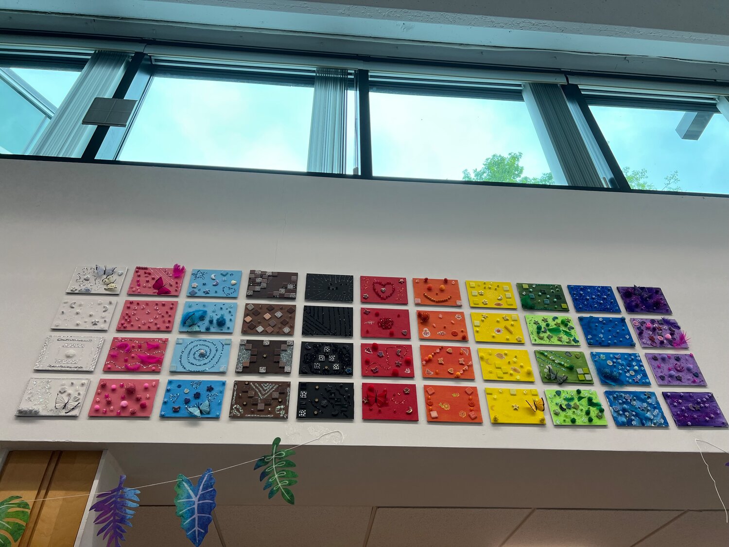 Uniondale Librarian transforms children section wall in honor of Pride ...