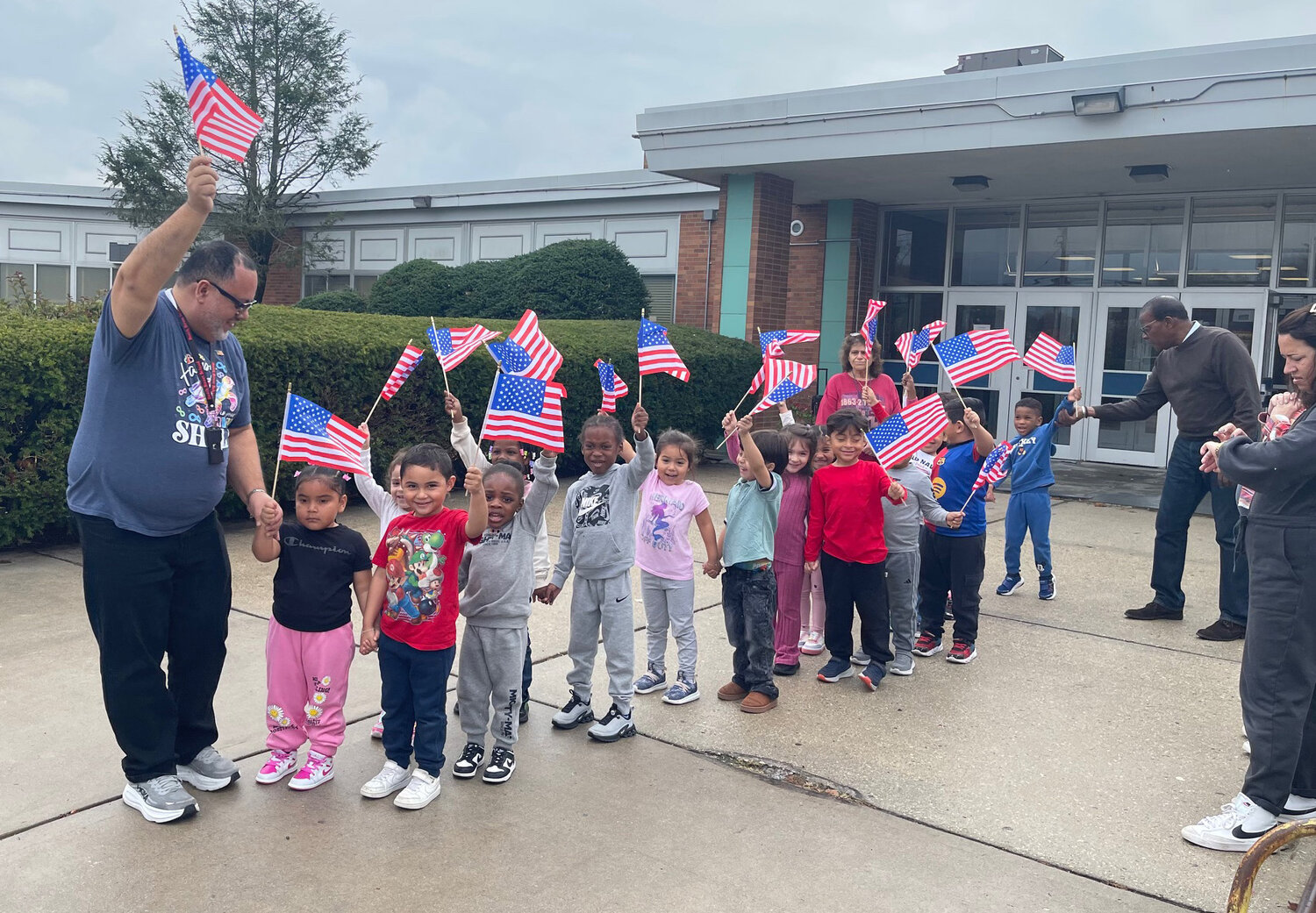 Every Smith Street Elementary student plants a flag for Veterans Day ...
