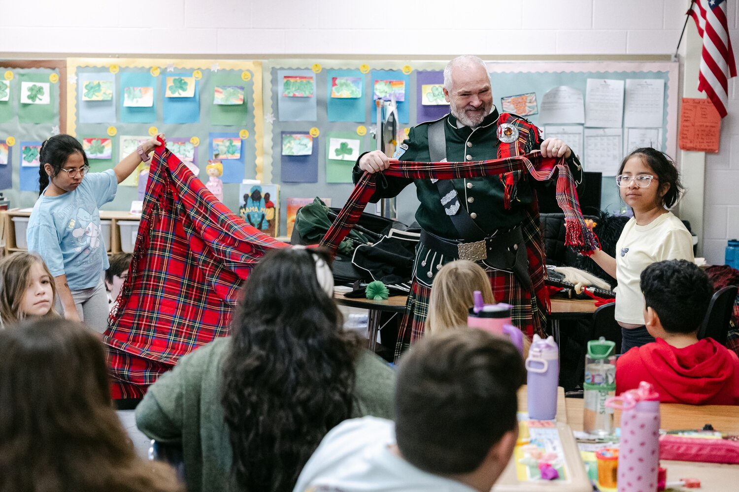 Rhame Avenue students celebrate St. Patrick’s Day with bagpipes ...