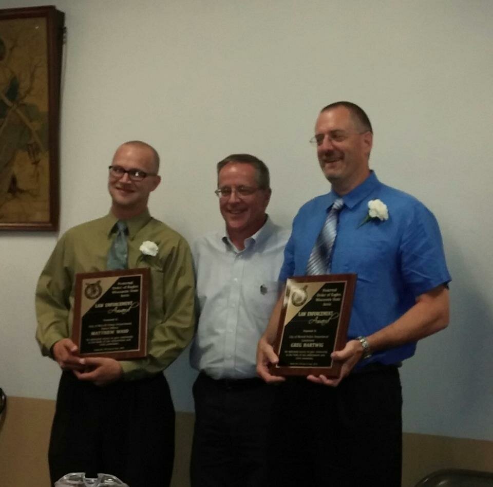 Merrill officers receive state commendation - Merrill Foto News