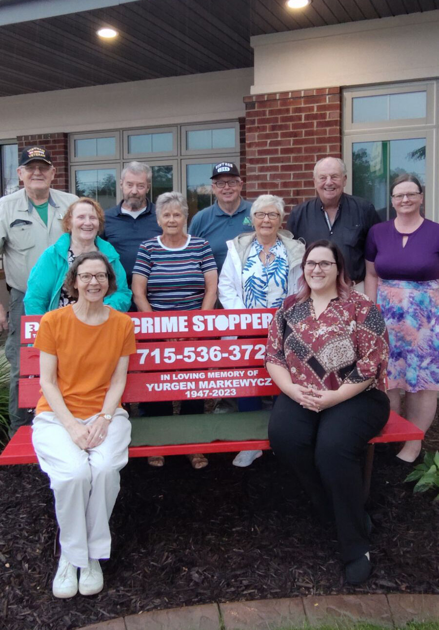 Yurgen is honored with new Crime Stoppers bench - Merrill Foto News