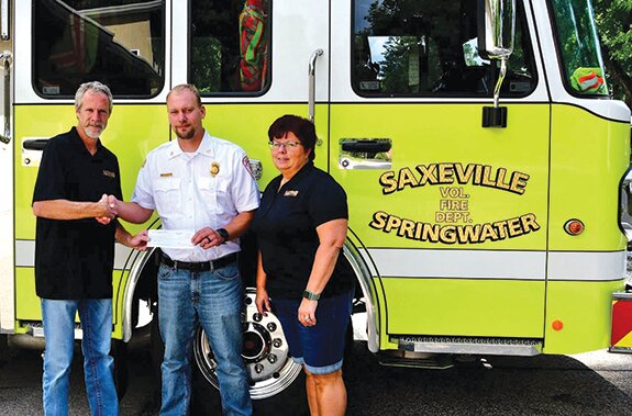 Oakwood Campsites presents donation to Saxeville Fire Department ...