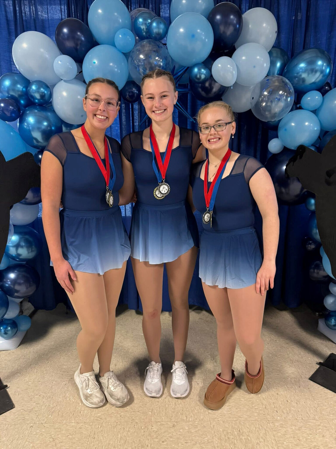 Merrill High School Figure Skating Team forms - Merrill Foto News
