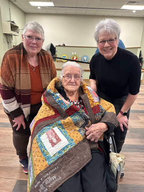 VFW Auxiliary honors Marie Skic with memory quilt - Merrill Foto News