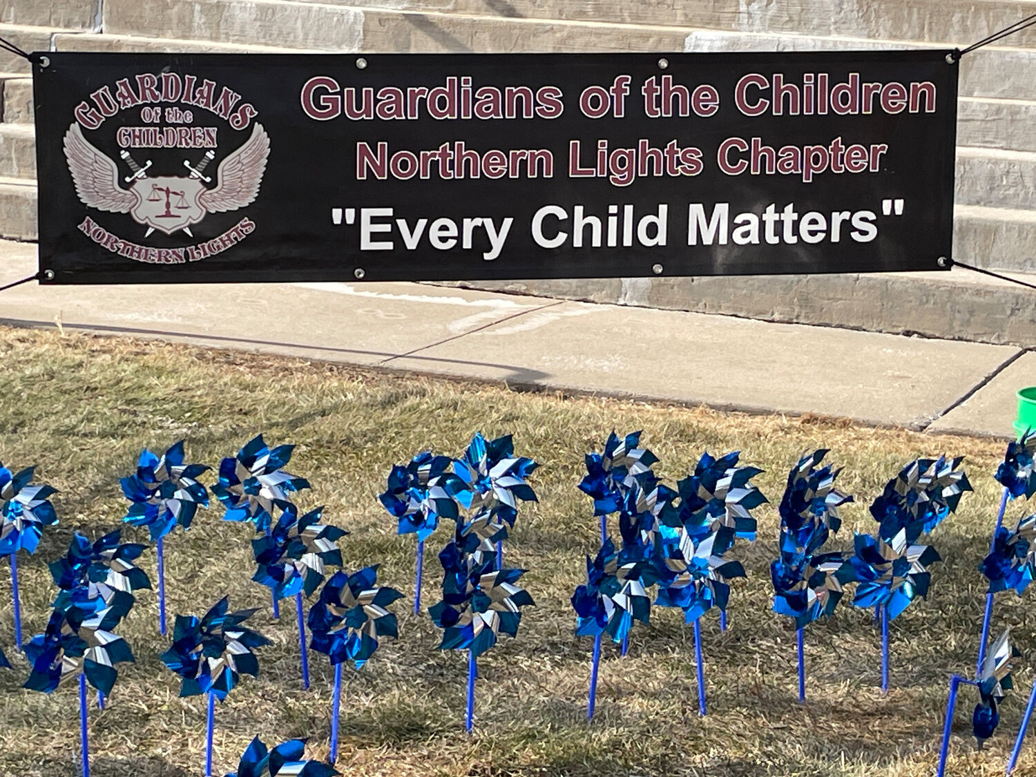 Guardians of the Children plant 105 pinwheels to stand against child ...