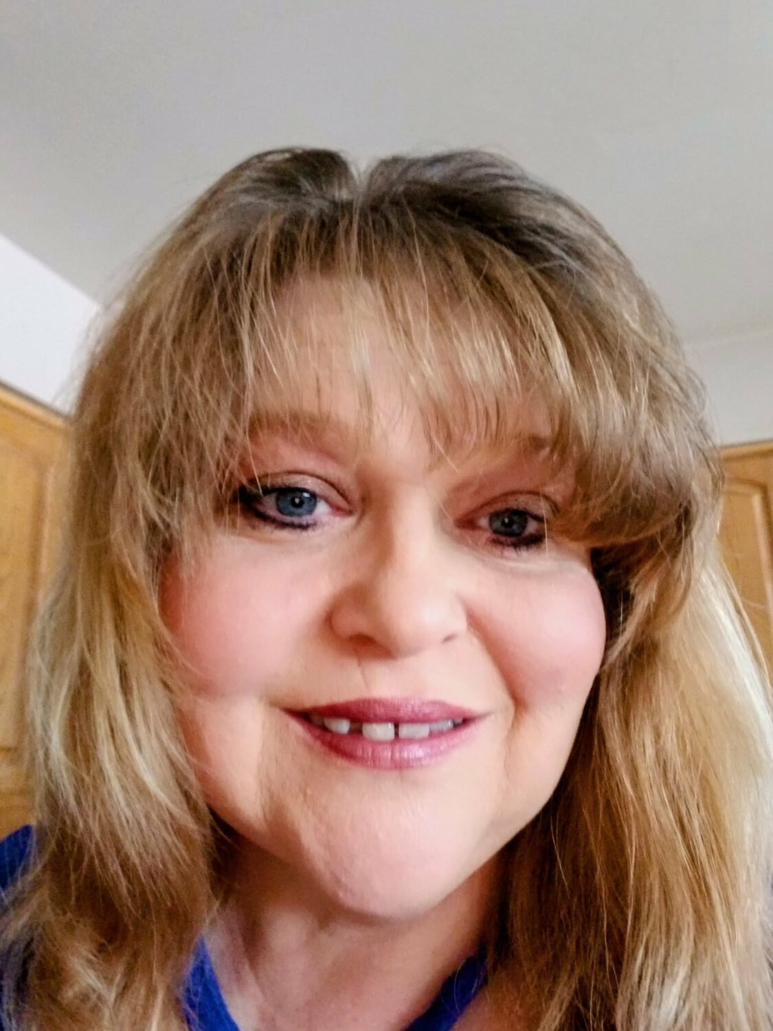 Carol J. Cortright - Merrill Foto News
