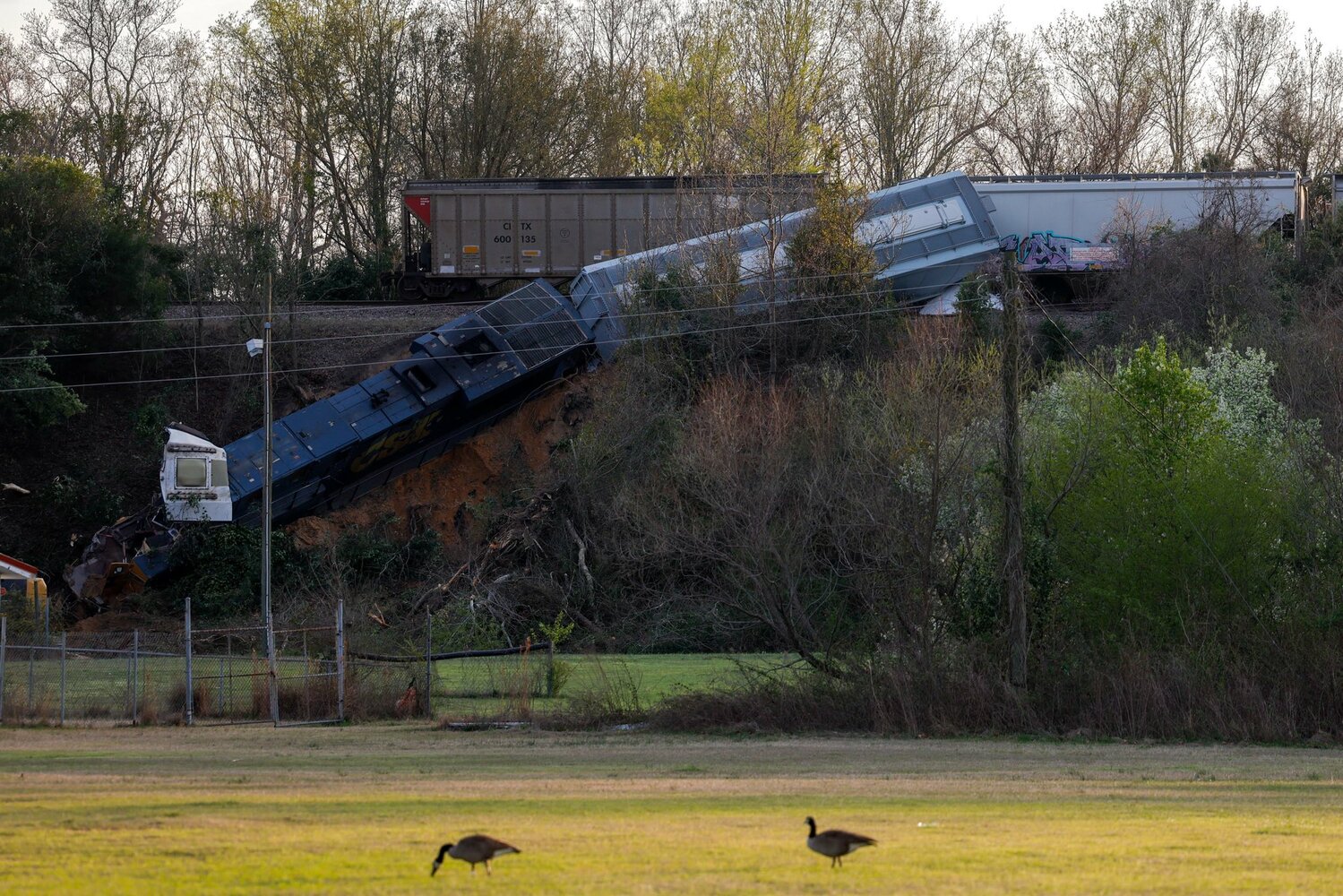 Locomotive, 18 cars derail following train collision in Hamlet ...