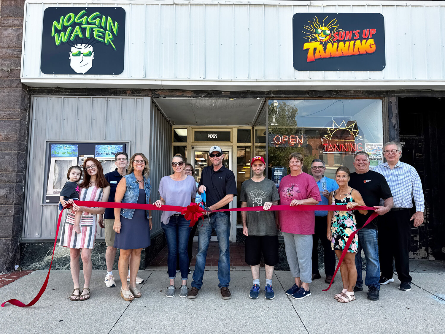 Noggin Water ribbon cutting - Storm Lake Times Pilot