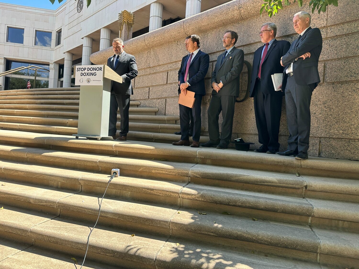 Arizona Supreme Court hears arguments on law identifying political ...